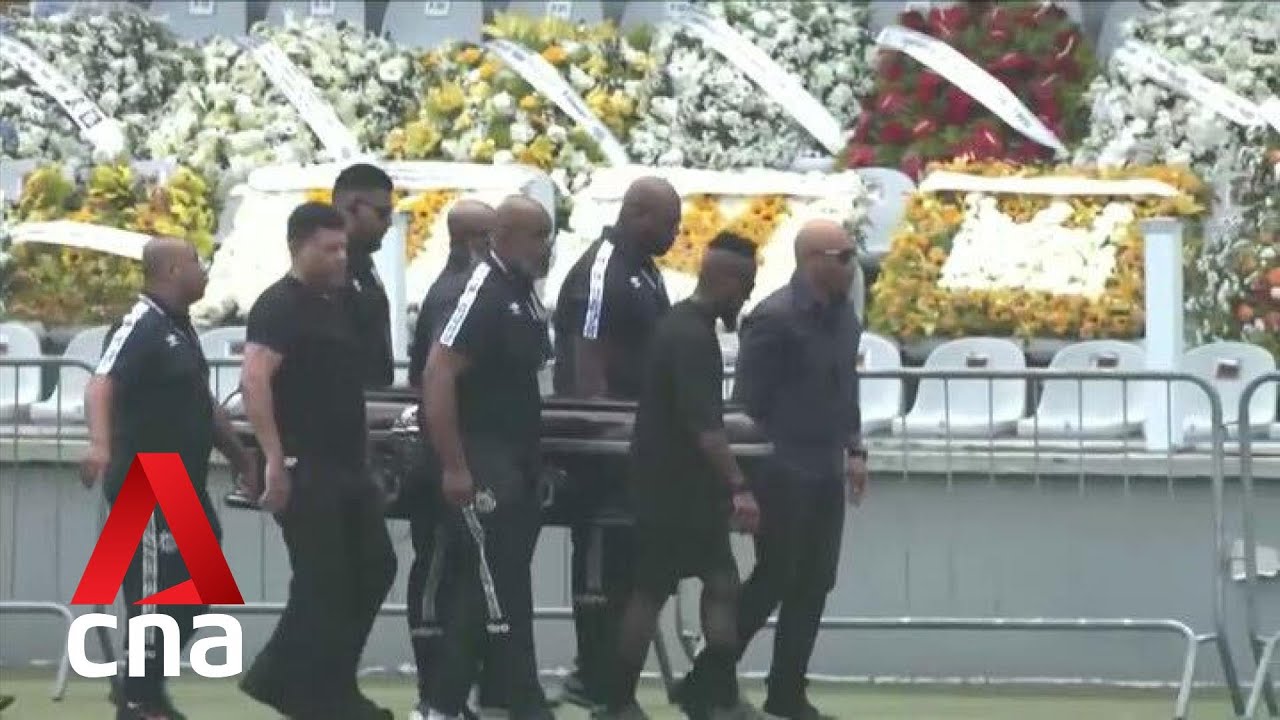 Football legend Pele's coffin carried into Santos stadium - YouTube