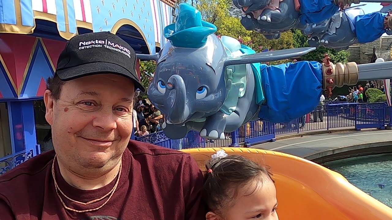 Dad and Daughter riding Dumbo at Disneyland - YouTube