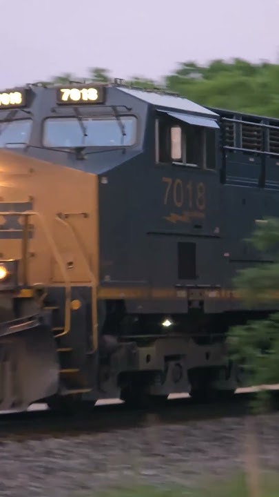 #csx 7018 on a run at portage east - YouTube