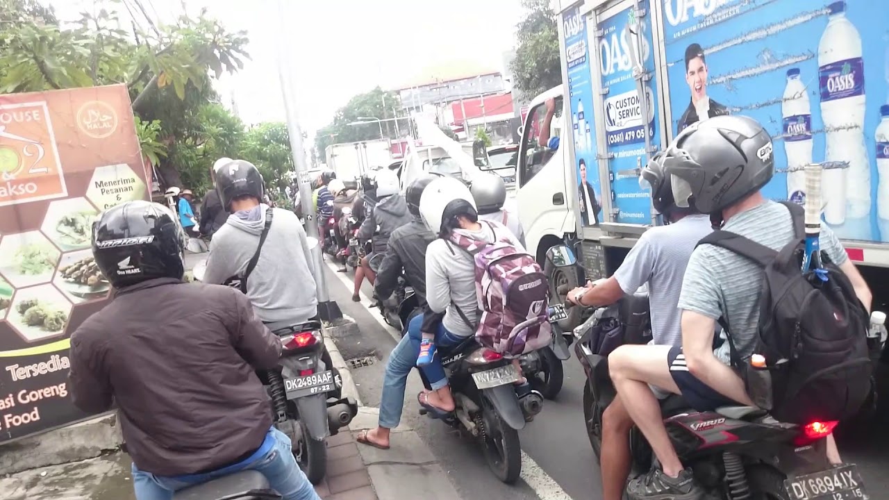 Crazy Traffic & Sidewalk Riding In Bali Indonesia - YouTube