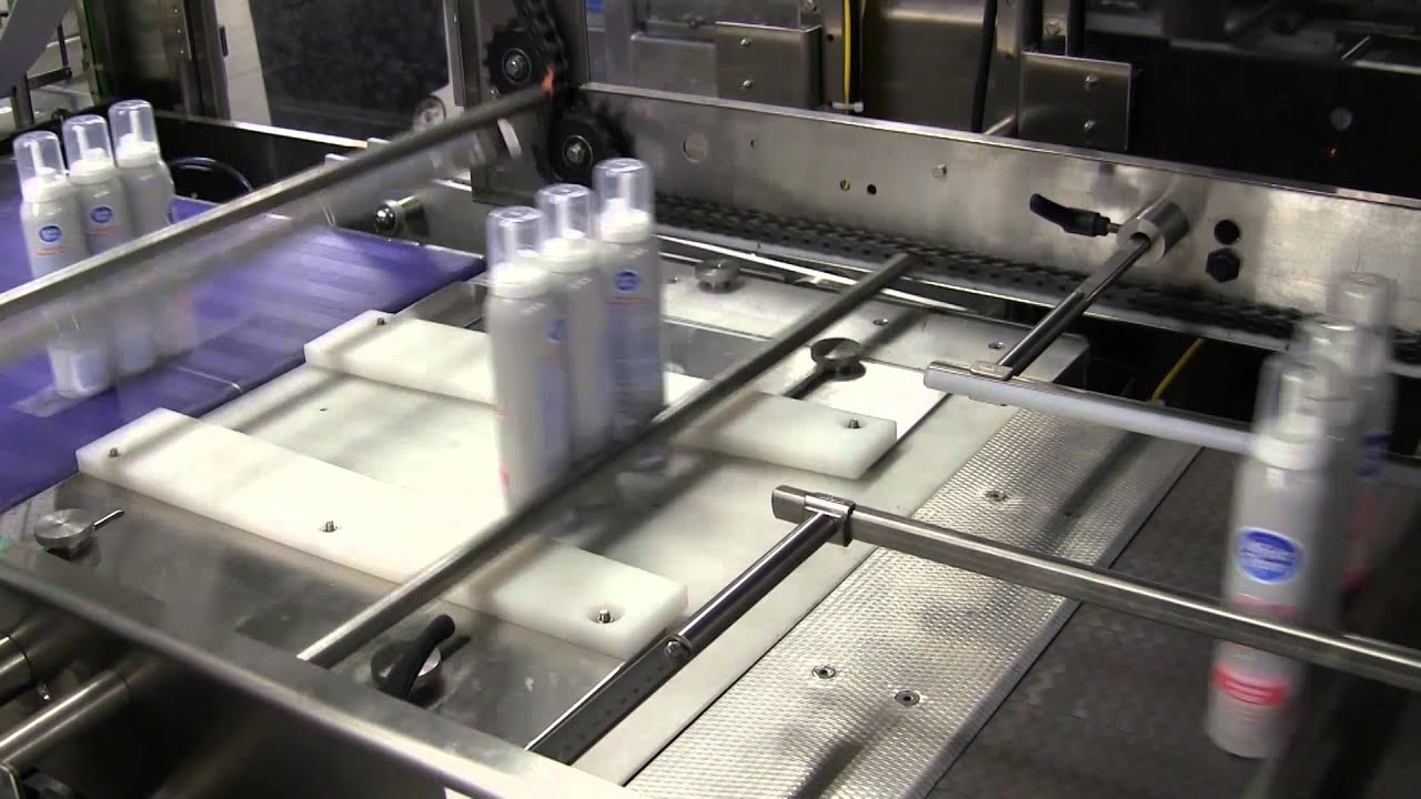 High Speed Shrink Wrap Machine Wrapping Aerosol Cans - YouTube