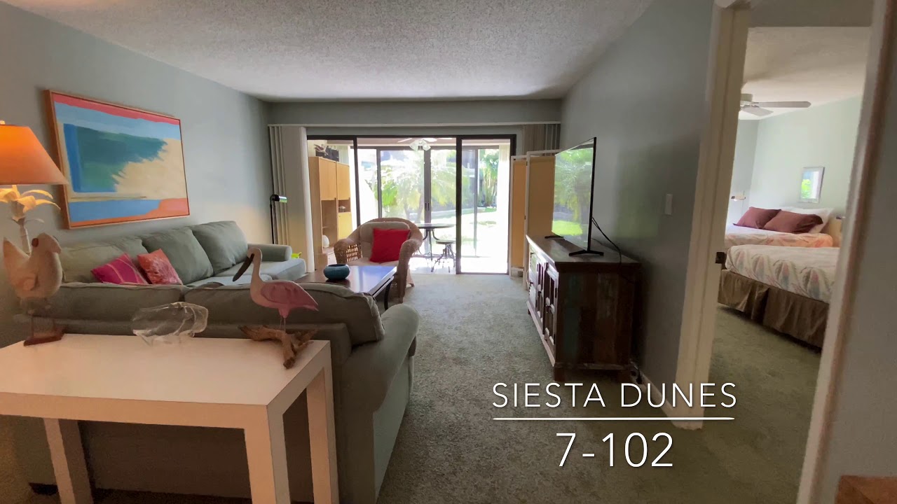 Siesta Dunes 7-102 Beach Inspired | Siesta Key Vacation Rentals - YouTube