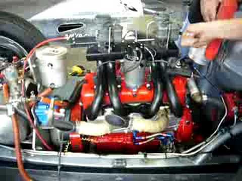 4 banger Bonneville motor 2nd firing - YouTube
