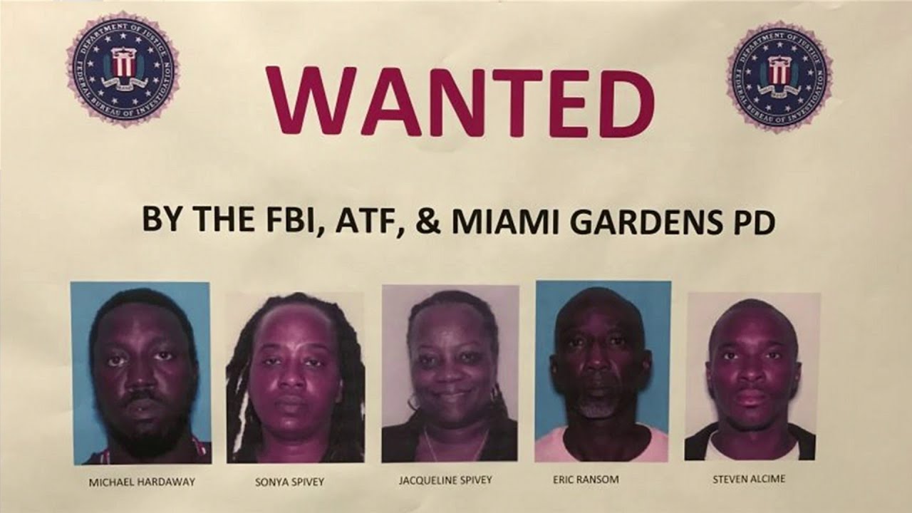 FBI agents search for 5 suspected gang members - YouTube