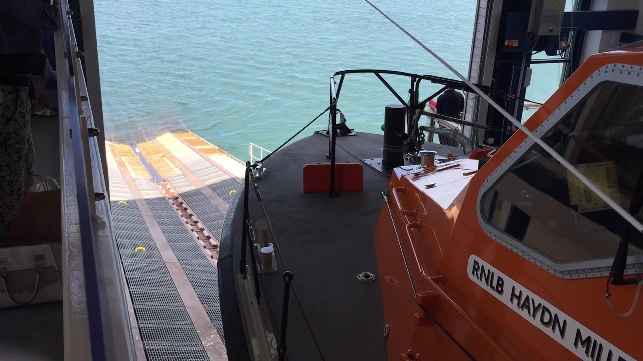 Tenby lifeboat launching from the boat house smashes in to water # ...