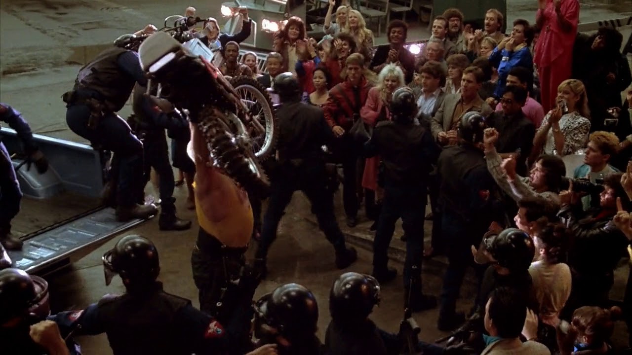 The Running Man - Buzzsaw lifts his motorcycle - YouTube