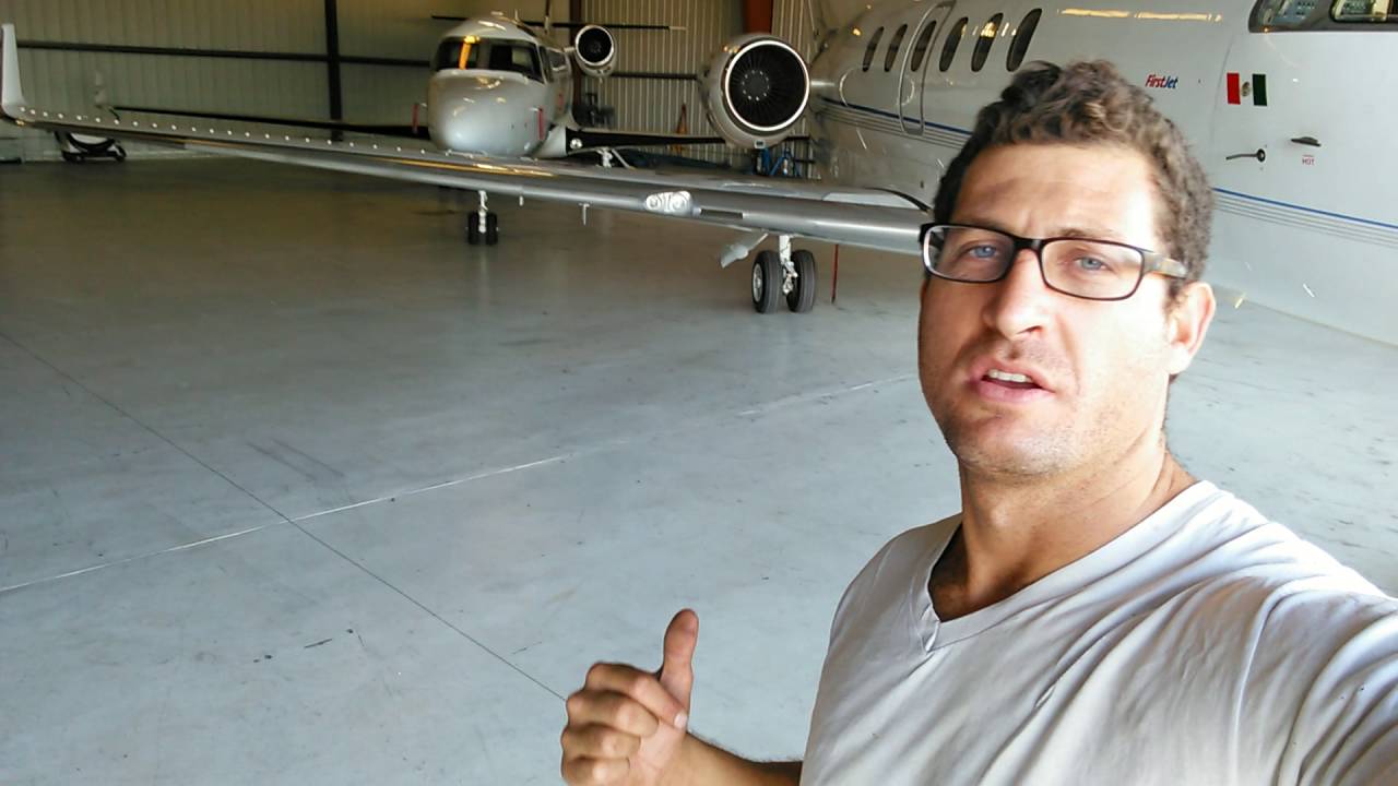 Here in my garage, just bought this new jet here - Tai Lopez - YouTube
