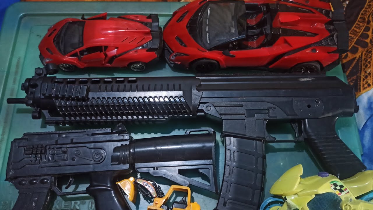 menemukan mainan mobil-mobilan, motor sport,tembakan rambo,pistol rambo ...
