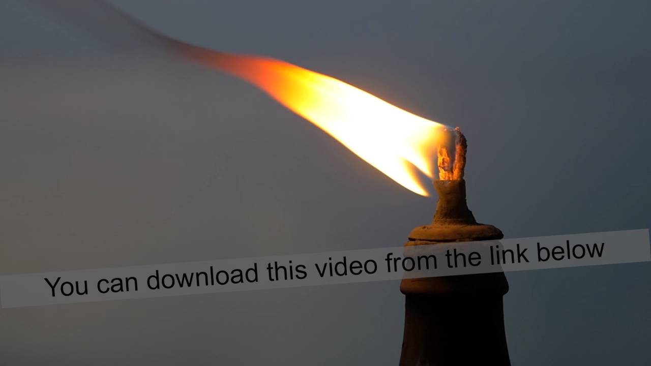 Outdoor torch flame in the wind - YouTube