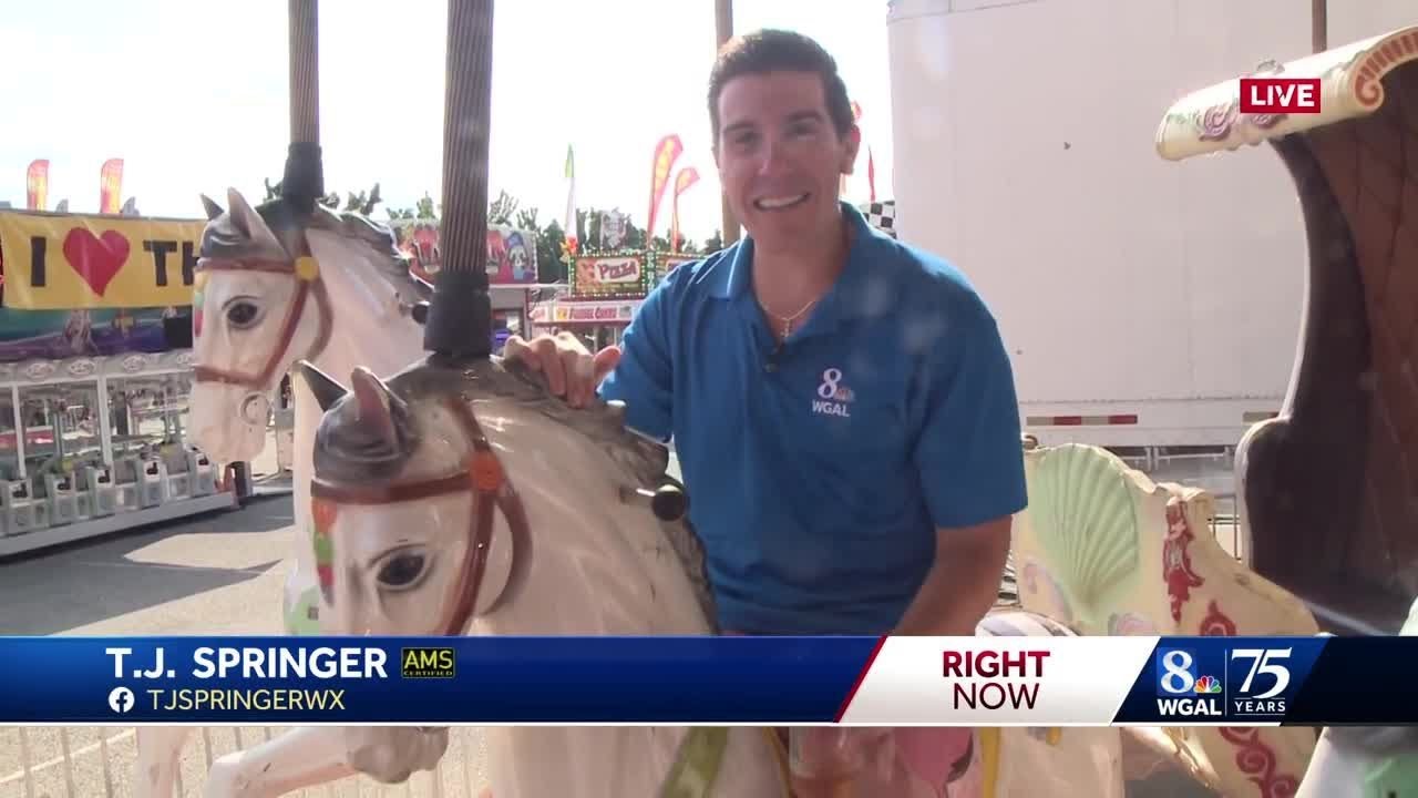 News 8's T.J. Springer rides the carousel at the York State Fair - YouTube