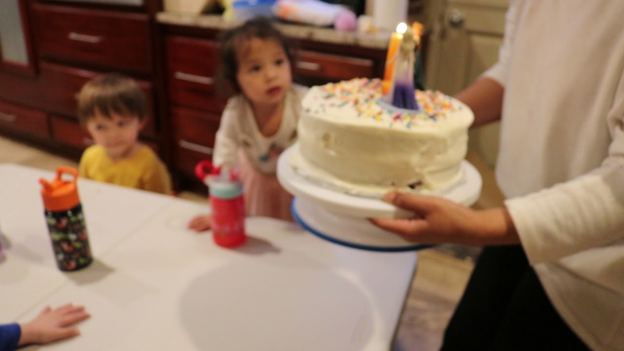 Ava 2 year birthday blowing candles - YouTube
