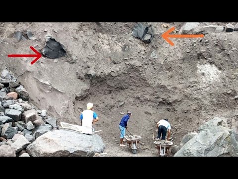 THERE ARE TWO BLACK ROCKS ON THE CLIFF WHERE THEY WORK - YouTube
