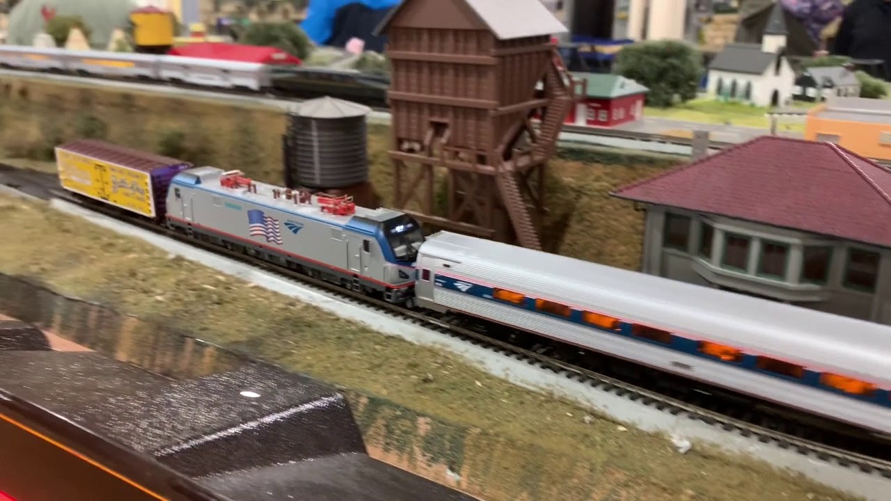 HO scale Amtrak ACS-64 pushing boxcar at World’s Greatest Hobby on Tour ...