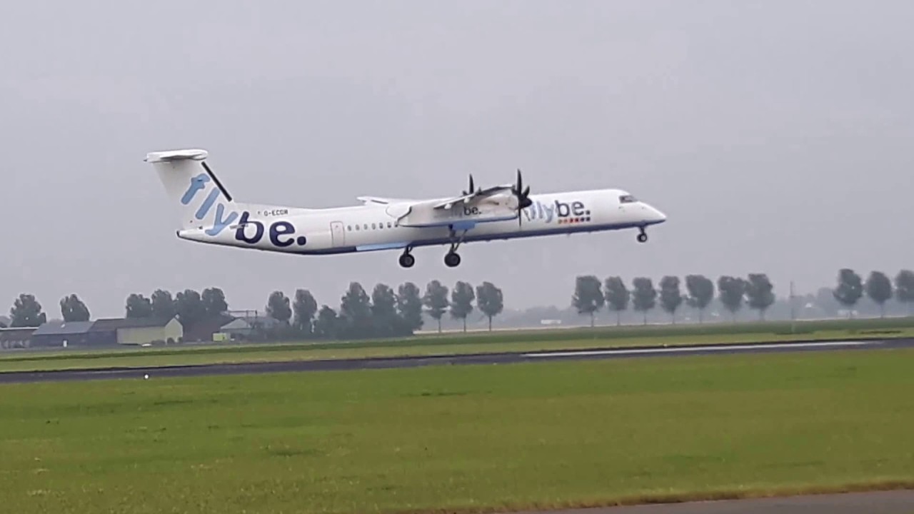 Flybe Crash-8 windy landing at Schiphol - YouTube