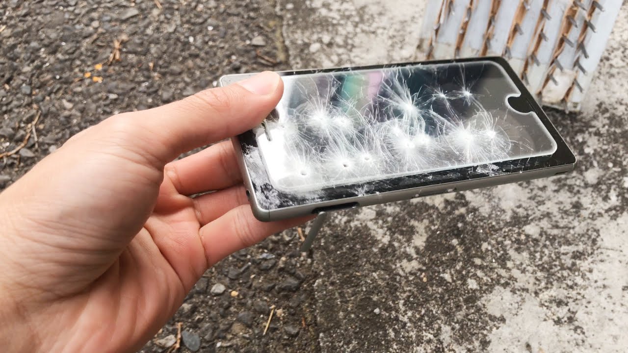 Destroyed 5 Layers of Tempered Glass - YouTube