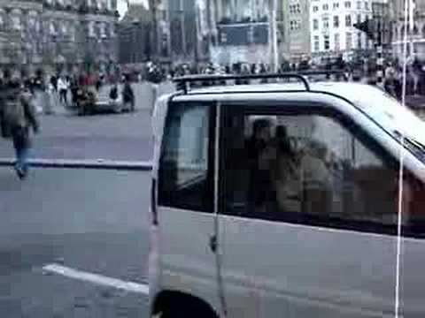 Amsterdam mini car, big guy - YouTube
