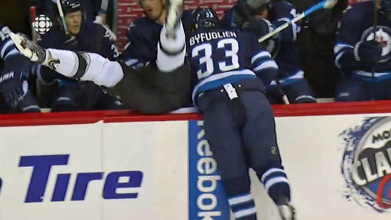 Byfuglien bulldozes Muzzin into the bench - YouTube