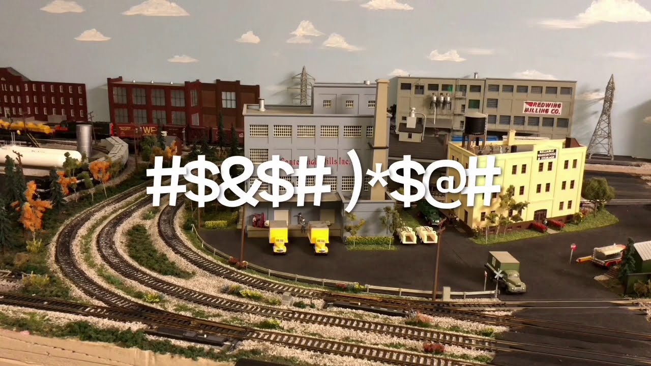 My 4x8x2 HO Layout - Oil and Freight trains run by JMRI Script - YouTube