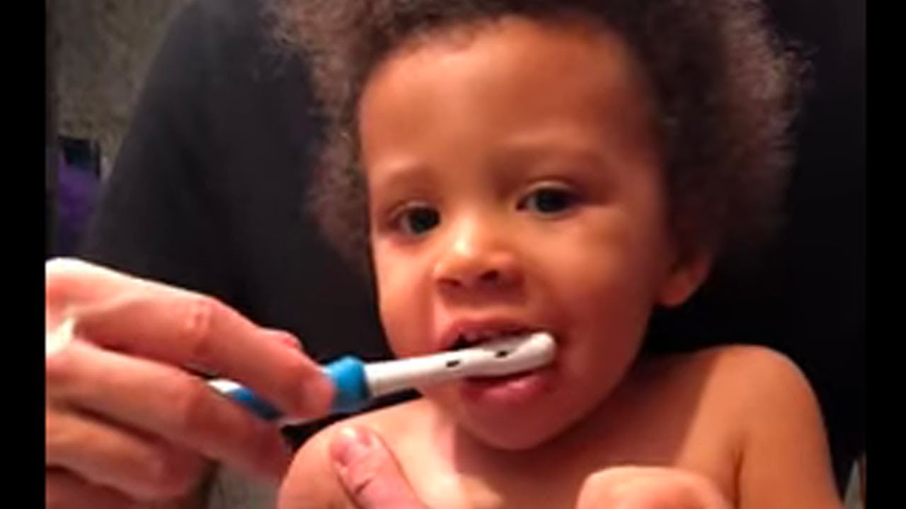 Toddler Using an Electric Toothbrush For The First Time - YouTube