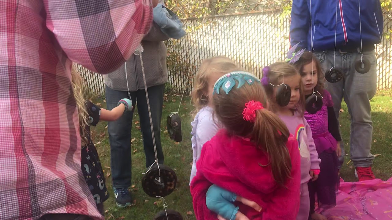 Determination is key. Donut on a string game. Silly girl. - YouTube