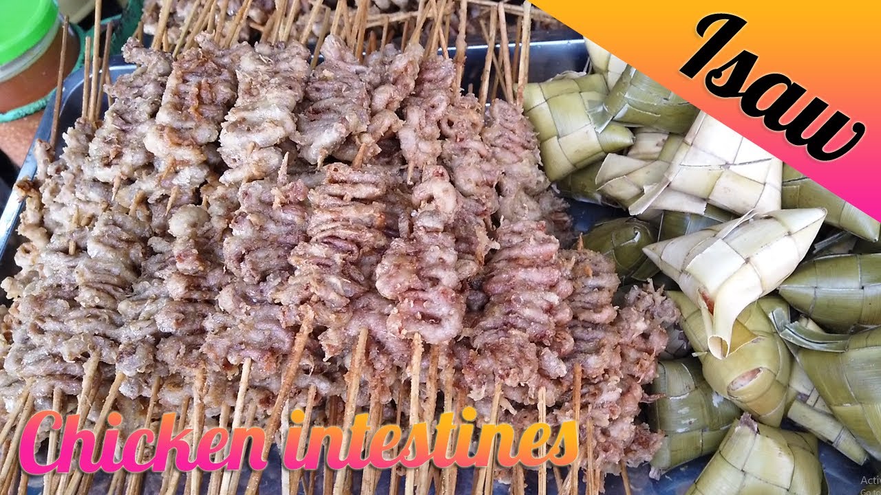 Isaw (chicken intestines on a stick) deep fried a mobile food stand ...