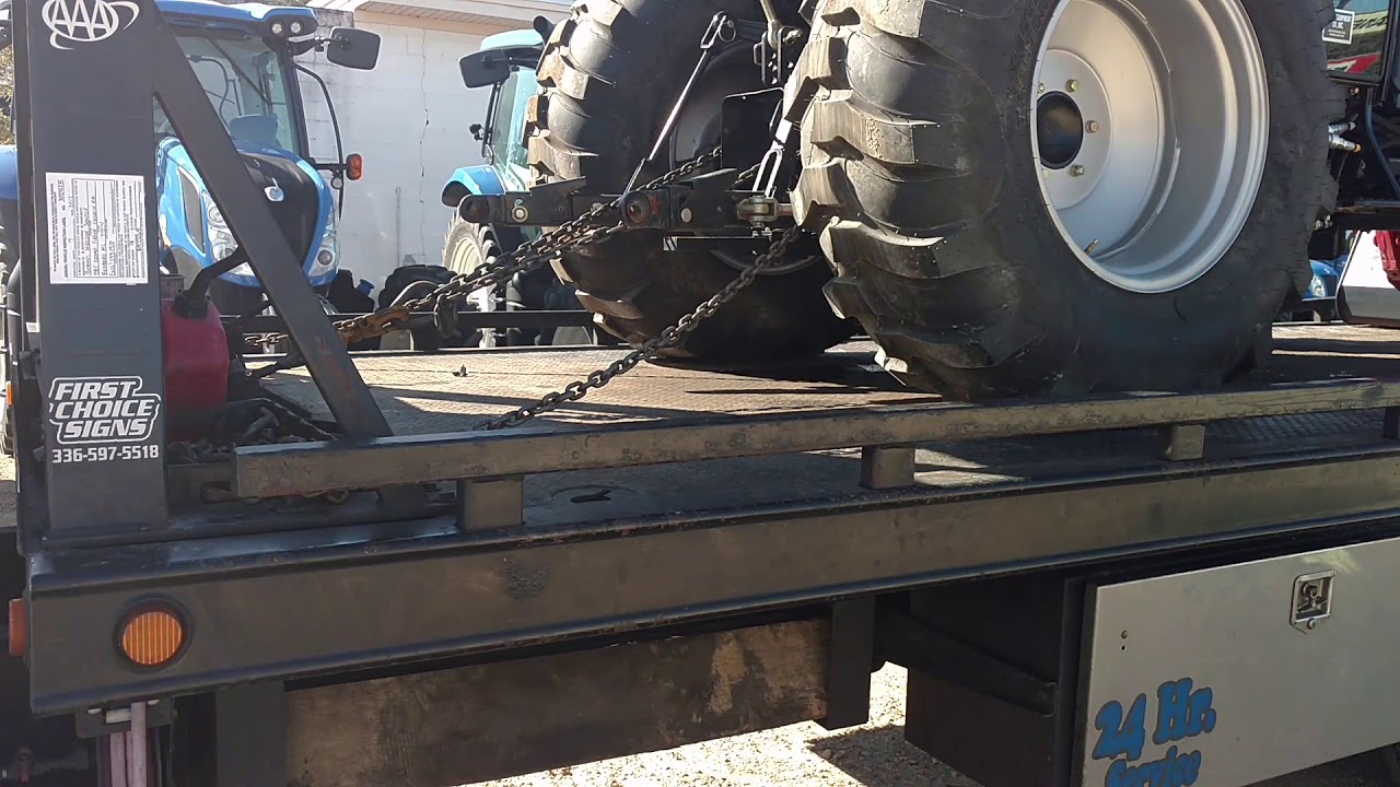 Hauling another tractor - YouTube