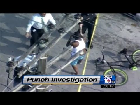 Police to investigate detective's punch - YouTube