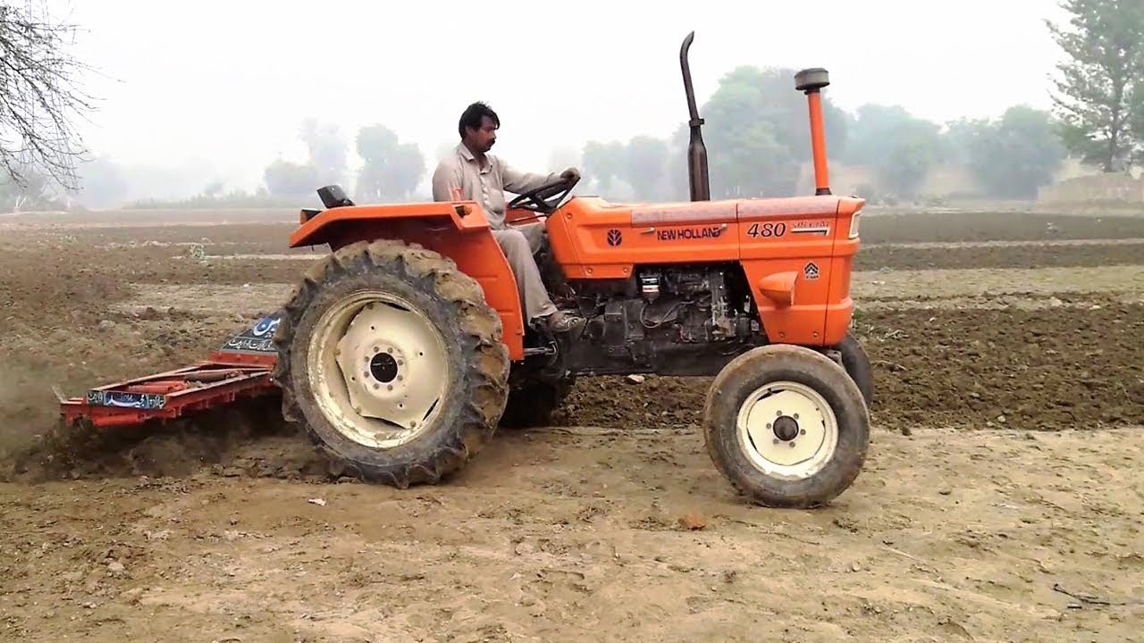 New Holland 480 Tractor with Cultivator - YouTube