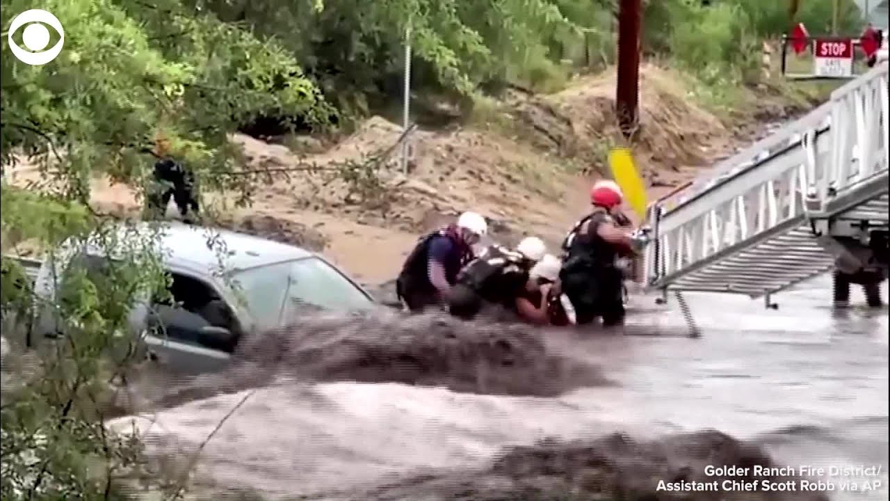 WEB EXTRA: Emergency Crews Rescue Person From Truck Trapped In Flood ...