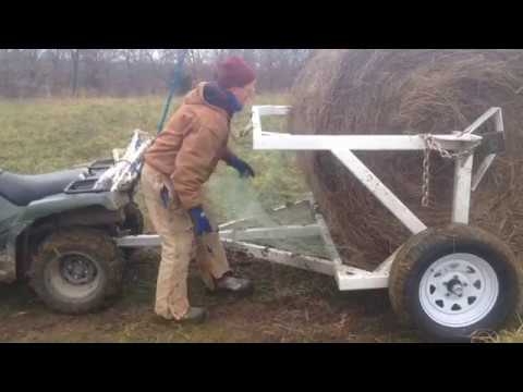 2018 unrolling 1800 lb bale Original GJ bale unroller - YouTube
