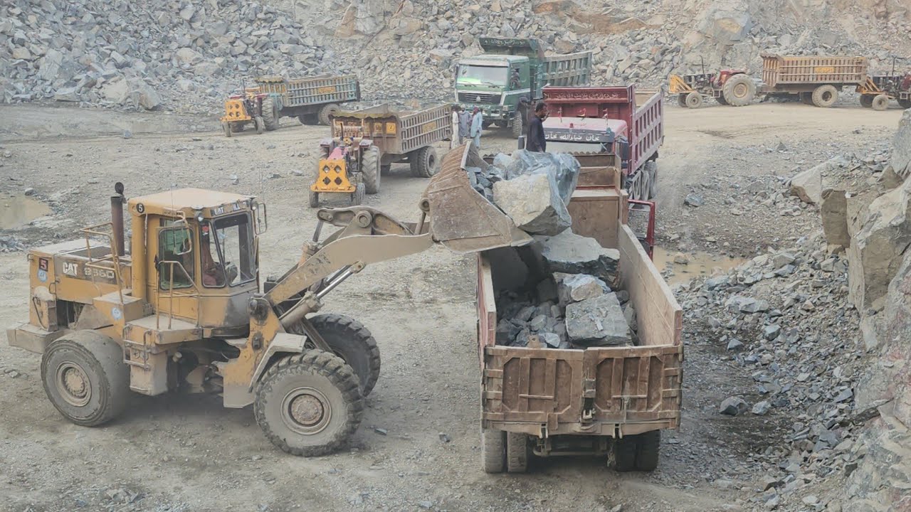 High Power CAT 966D Wheel Loader | Big Rock Loading into Massive Dump ...