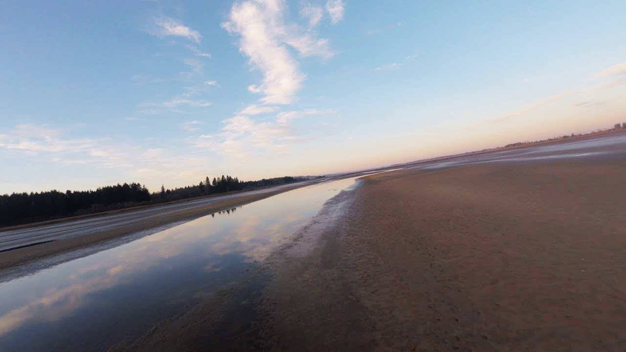 skimming the river that is left from the empty lake bed. - YouTube