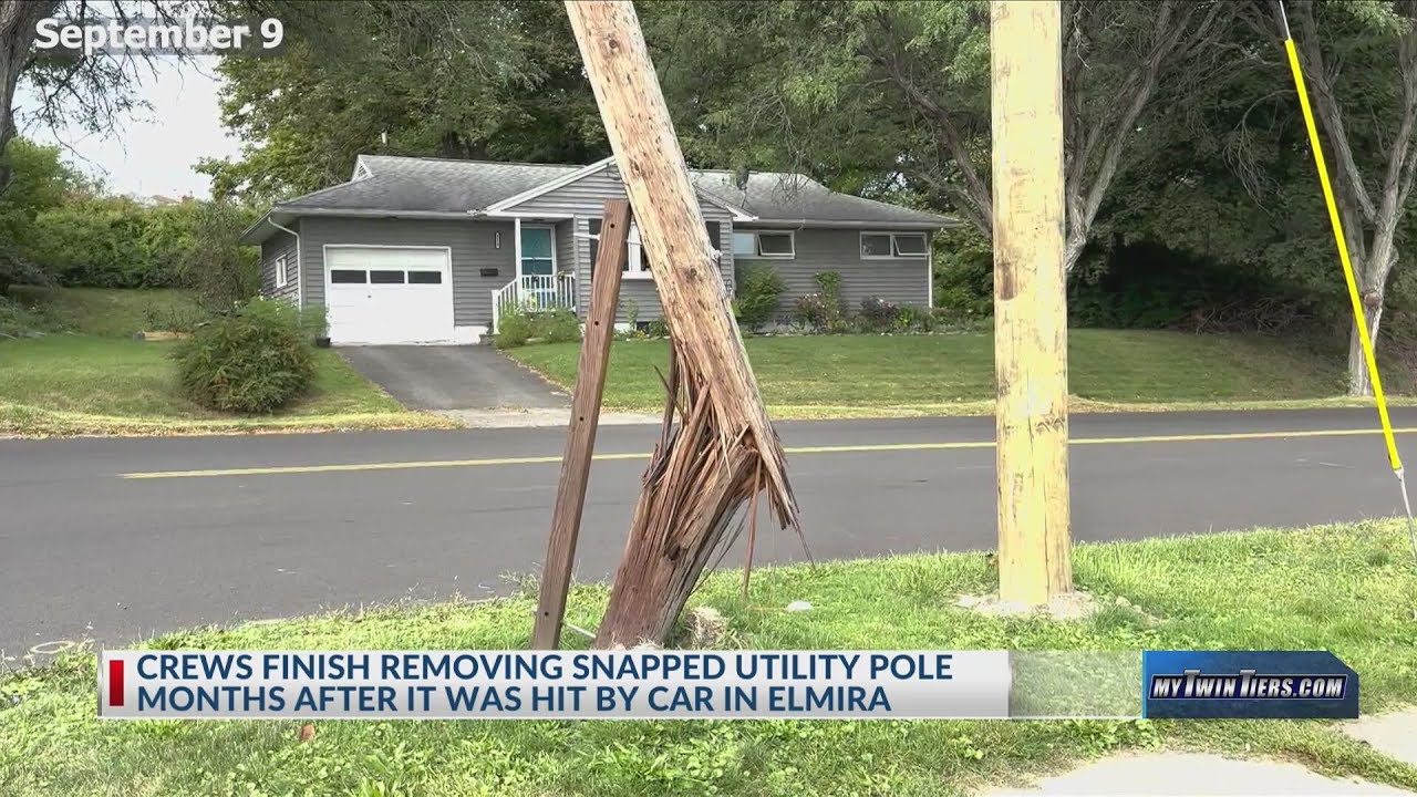 Crews remove snapped utility pole hit by car months ago in Elmira - YouTube