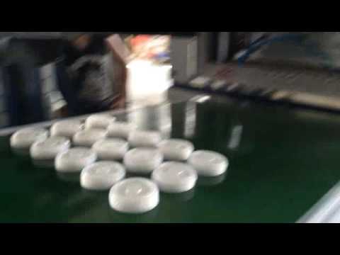 lid stacking machine - YouTube