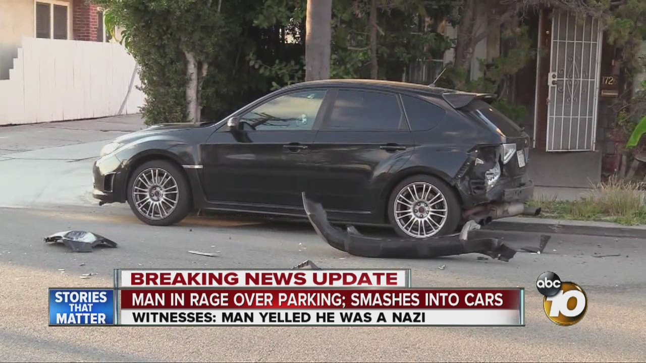 Man in rage over parking smashes into cars - YouTube