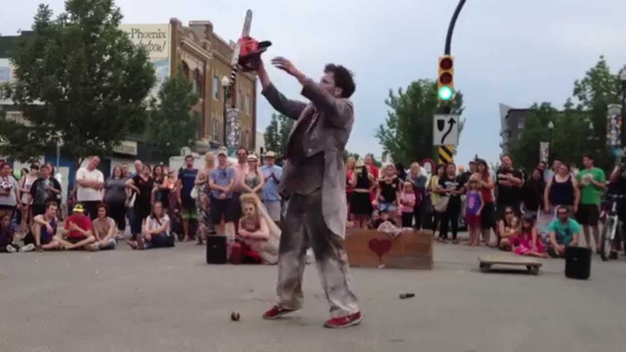 Zombie Juggles Chainsaw - YouTube