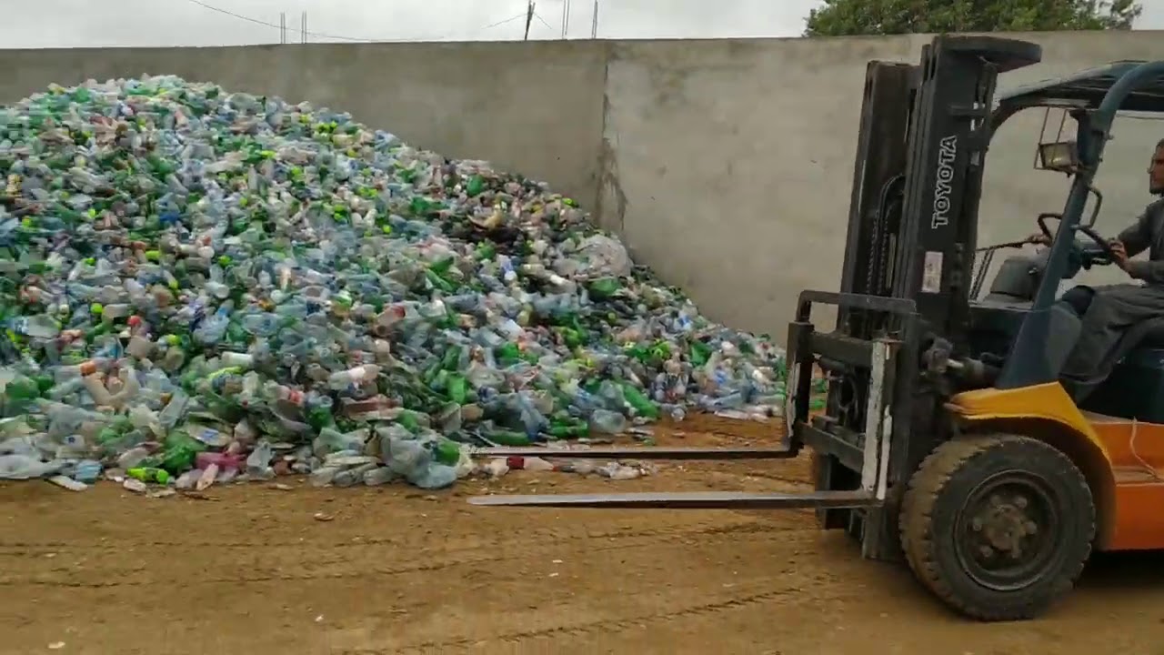 Pet Bottles bales loading - YouTube
