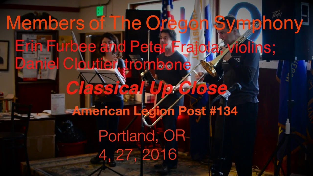 Members of The Oregon Symphony: Erin Furbee and Peter Frajola, violins ...