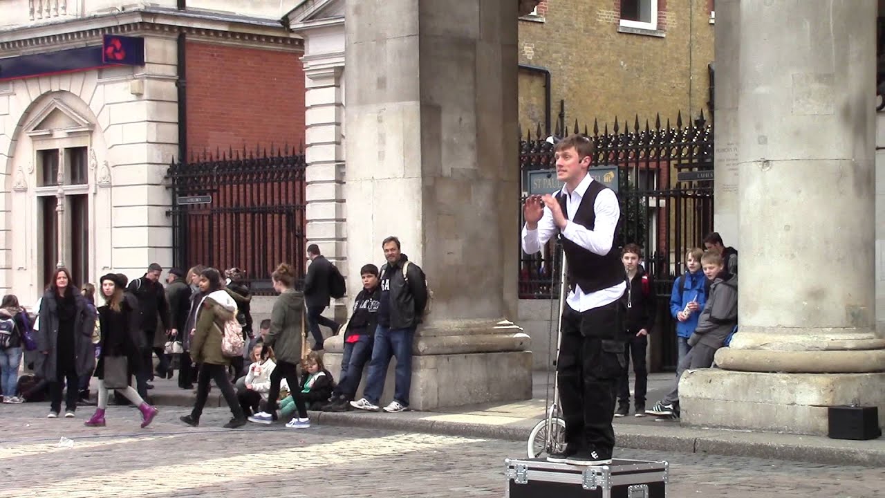 Street Performance - Juggling and Unicycle Act - YouTube