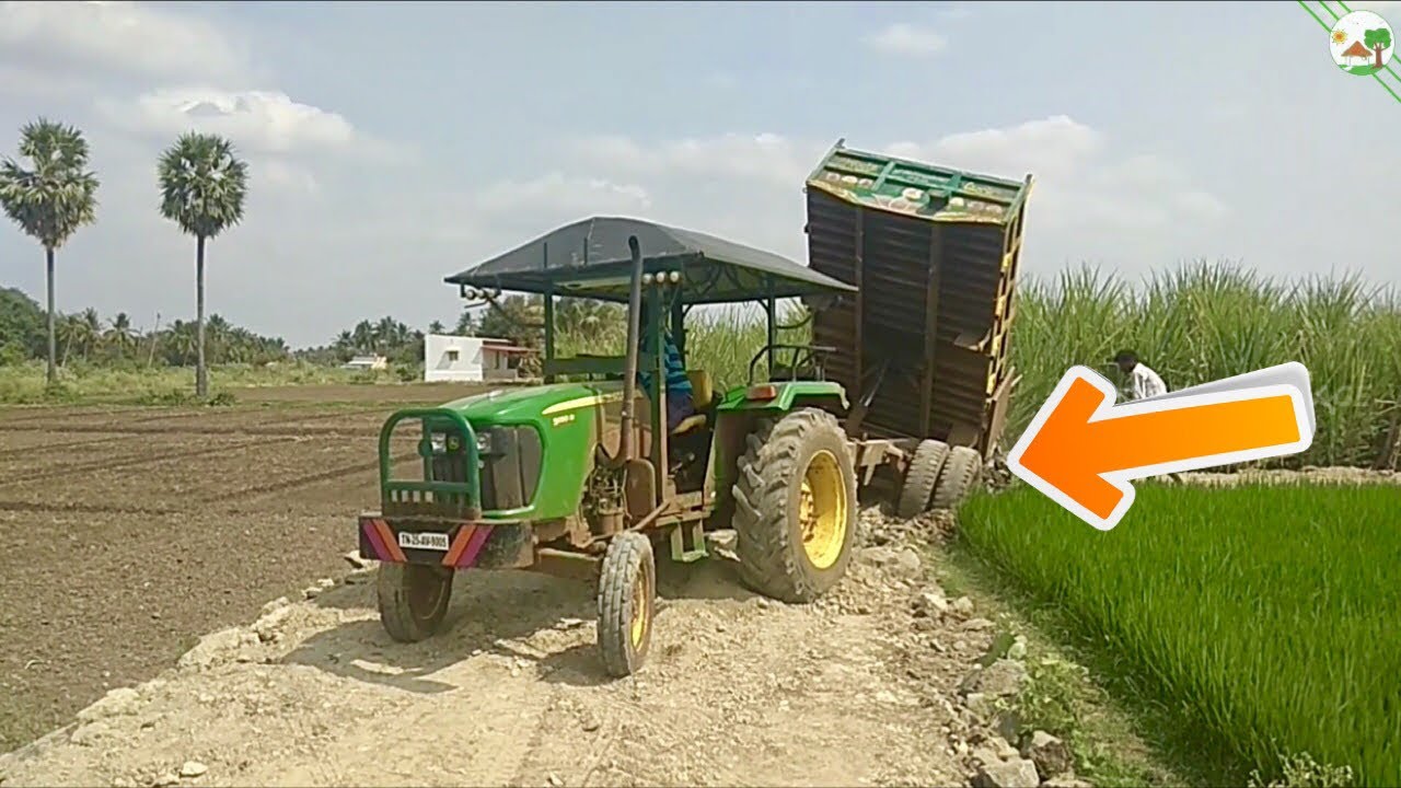 John Deere tractor stuck in soil road with Tractor Trailer | Come To ...