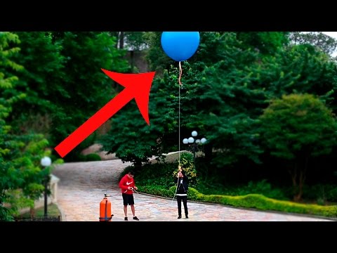 ENCHENDO A BEXIGA GIGANTE COM GÁS HÉLIO!