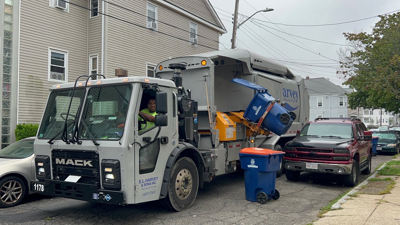 Harvey Disposal Dual Arm Garbage Truck Packing Trash - YouTube