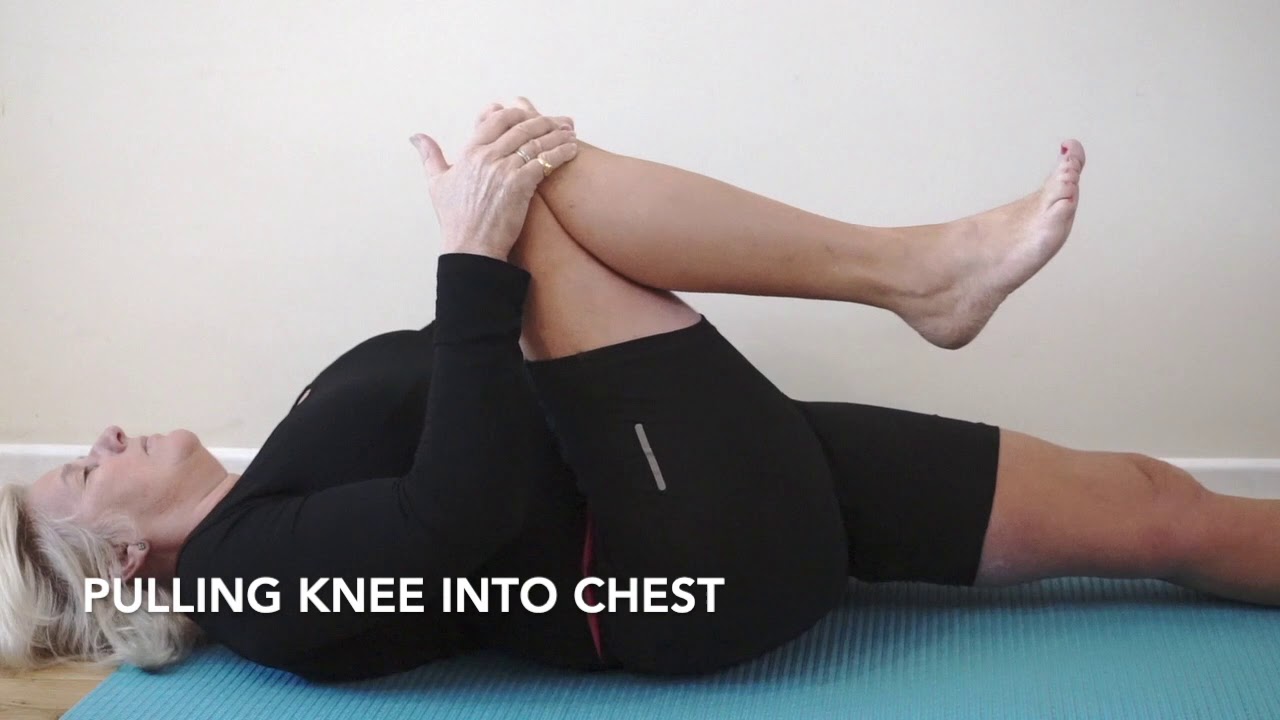 Knee pulls into chest in lying - YouTube