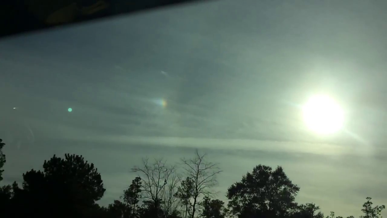 Strange Bright spot in sky (Sundog) - YouTube