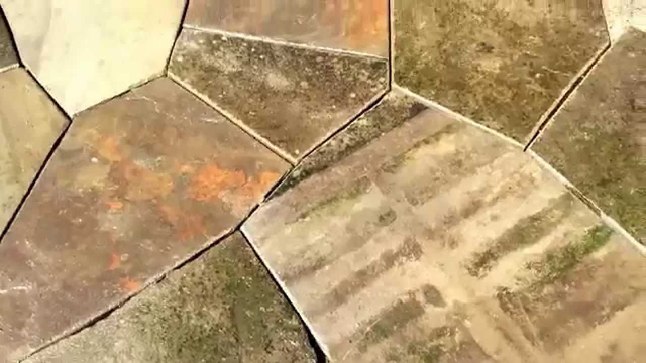 Cutting in narural flagstone for a beautiful tight joint patio - YouTube