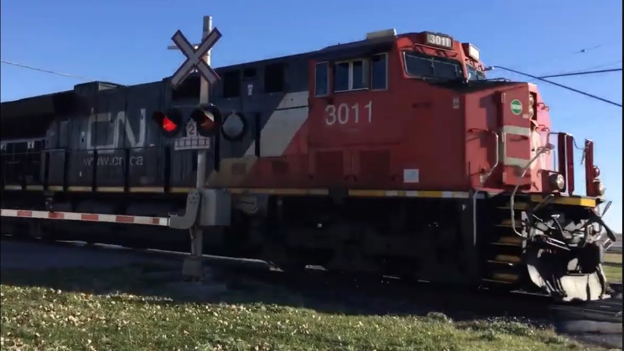 CN 3011 Leading a Half Oil-Manifest Train Heading Westbound Through ...