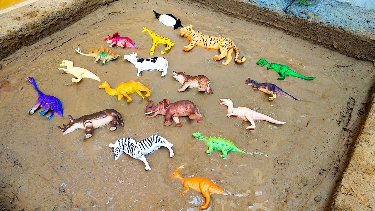Plastic Toy Dinosaurs and Animals Stuck in the Sandbox | Lots of Dino ...
