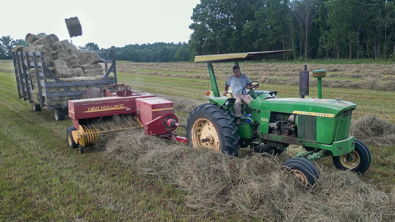Sending Hay Bales Flying with Kicker Baler - YouTube