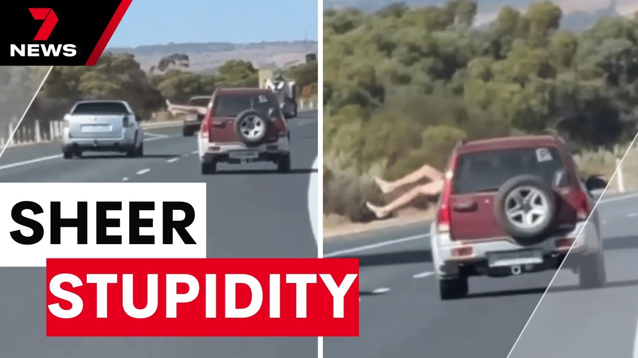 Passenger filmed dangling legs out of fast-moving car on Northern ...