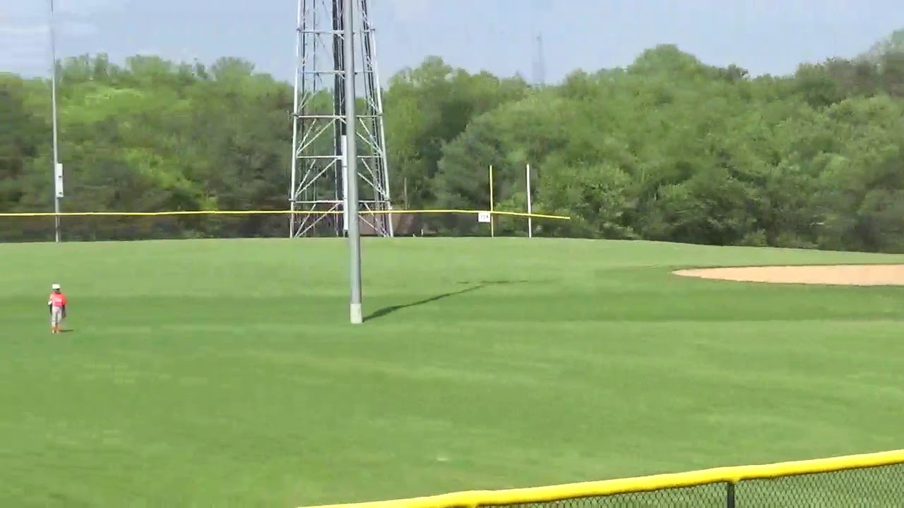 8 year old hits ~200 ft home run - YouTube